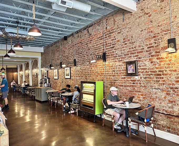 Real people enjoying real food in a space designed for lingering, not rushing through another forgettable meal.