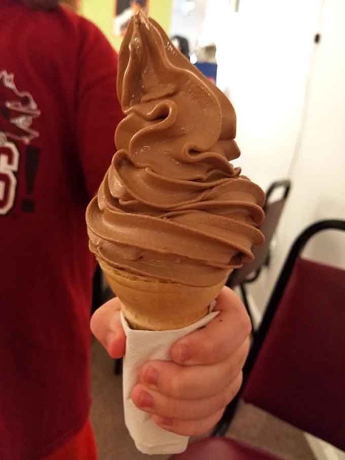 That chocolate soft-serve swirl is towering proof that ice cream cones should always be this generous and delicious.