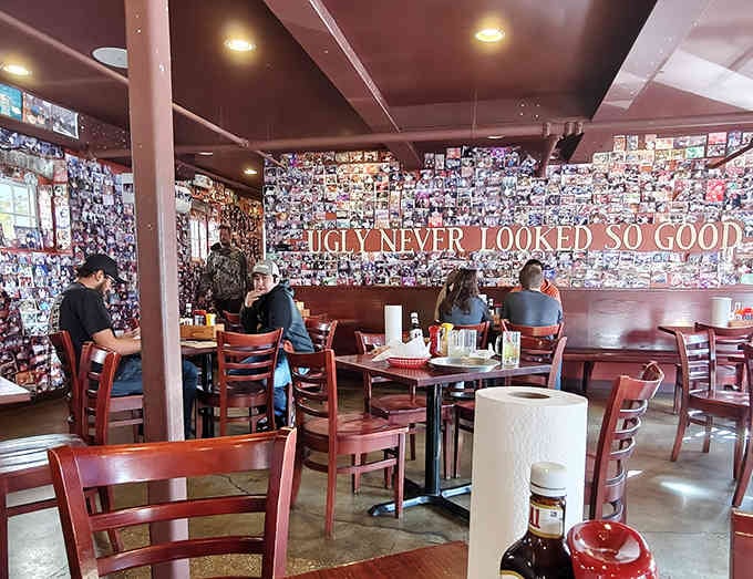 The dining room buzzes with anticipation as customers prepare to tackle burgers that require strategic planning and commitment.