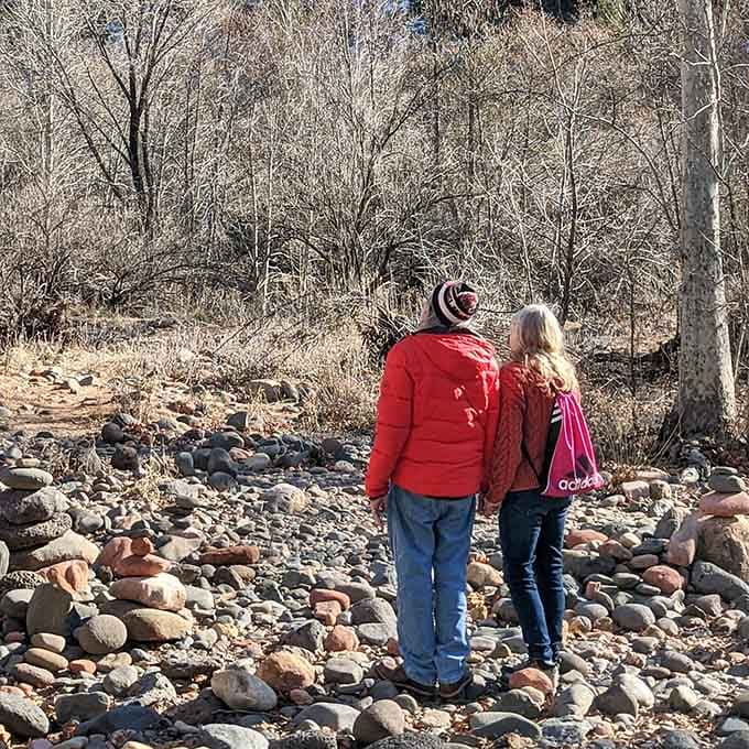 A quiet moment by the creek where the only soundtrack needed is flowing water and rustling cottonwood leaves overhead.