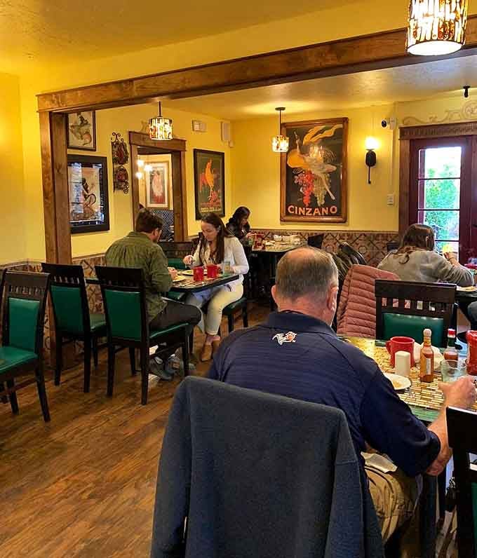 Vintage posters and happy diners create the kind of bustling brunch atmosphere where good times are practically guaranteed.