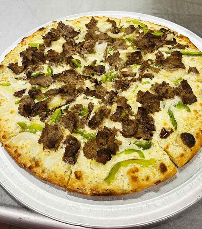 Steak and peppers transform this pie into a Philly cheesesteak's pizza cousin, and honestly, the family resemblance is delicious.