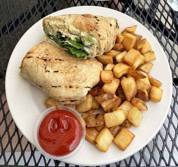 Even the veggie burrito gets Mediterranean treatment here, wrapped tight and served with perfectly seasoned potatoes on the side.