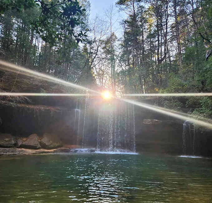 When the sun decides to photobomb your waterfall shot, you just roll with it and call it art.