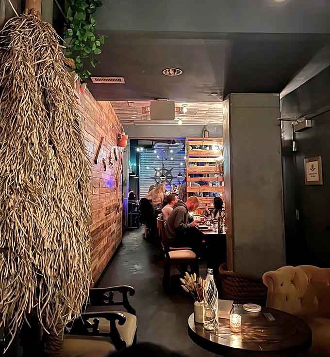 Thatched walls and intimate seating create the perfect hideaway for conversations that deserve better than shouting over crowds.