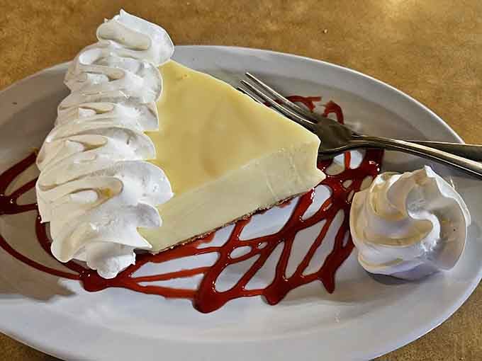 Key lime pie topped with whipped cream mountains, because you definitely have room for dessert somehow.