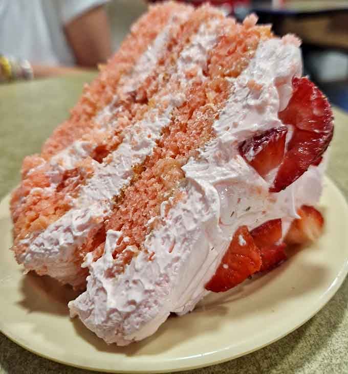 This towering slice of strawberry cake looks like something your grandmother would serve at Sunday dinner, only bigger.