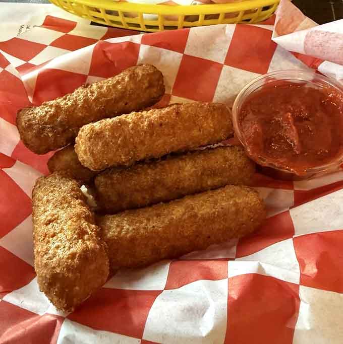 Mozzarella sticks: proof that stretchy cheese and marinara solve most of life's problems quite nicely.