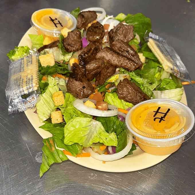 When your salad comes topped with actual steak chunks, suddenly eating greens doesn't feel like punishment anymore.