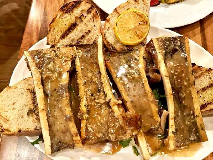 Roasted bone marrow with grilled bread, because sometimes the most primal foods are also the most elegant choices.