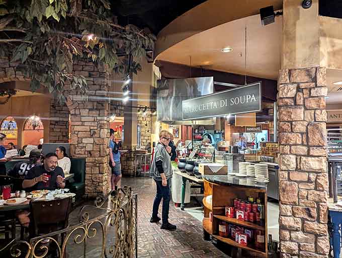 Stone archways and decorative vines transform a buffet experience into something that feels genuinely transportive and inviting.