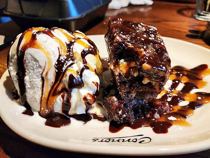 Brownie sundae with ice cream and enough chocolate sauce to make your dentist schedule a follow-up appointment.