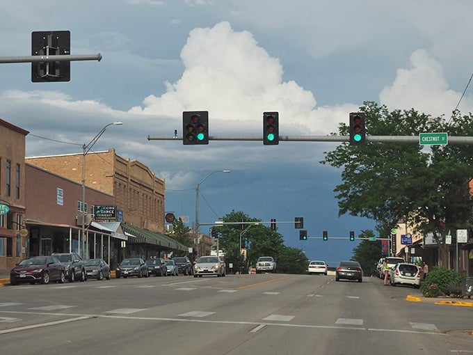 Traffic lights on Main Street where rush hour means waiting behind three cars instead of three hundred vehicles.