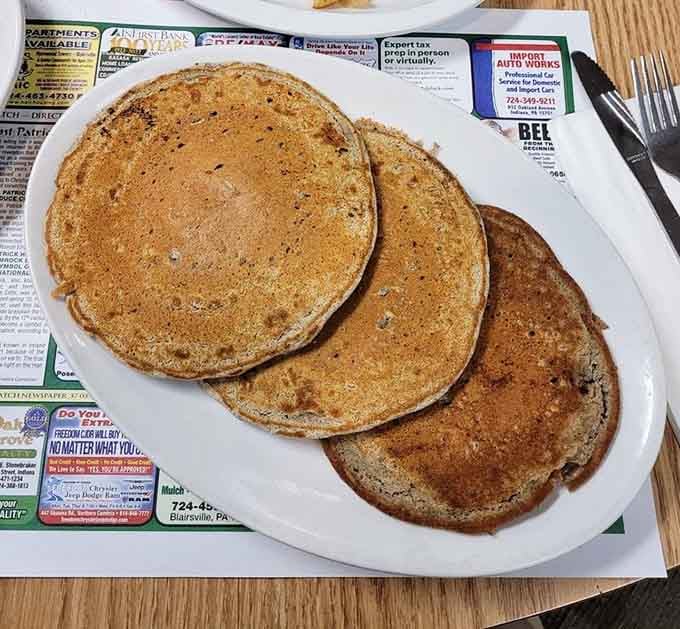 Three golden pancakes that prove sometimes the simplest things in life are absolutely the most perfect.