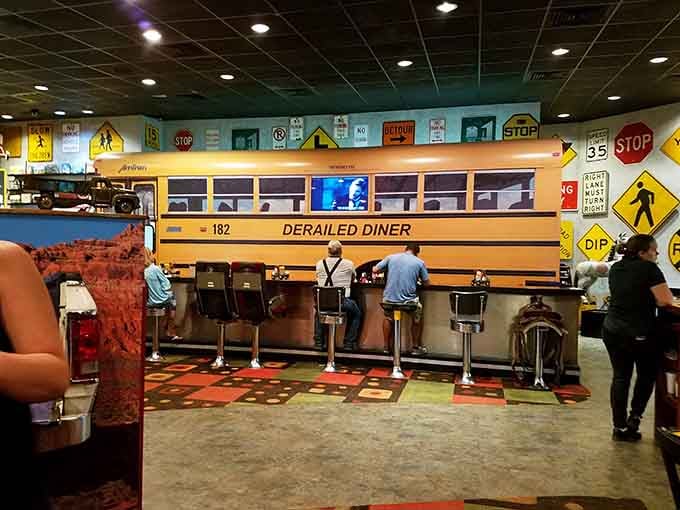 That yellow school bus isn't just decor, it's a statement that this place takes nostalgia seriously and serves it with style.