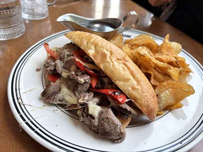 That steak sandwich is piled high with tender meat that practically melts before you even take a bite.