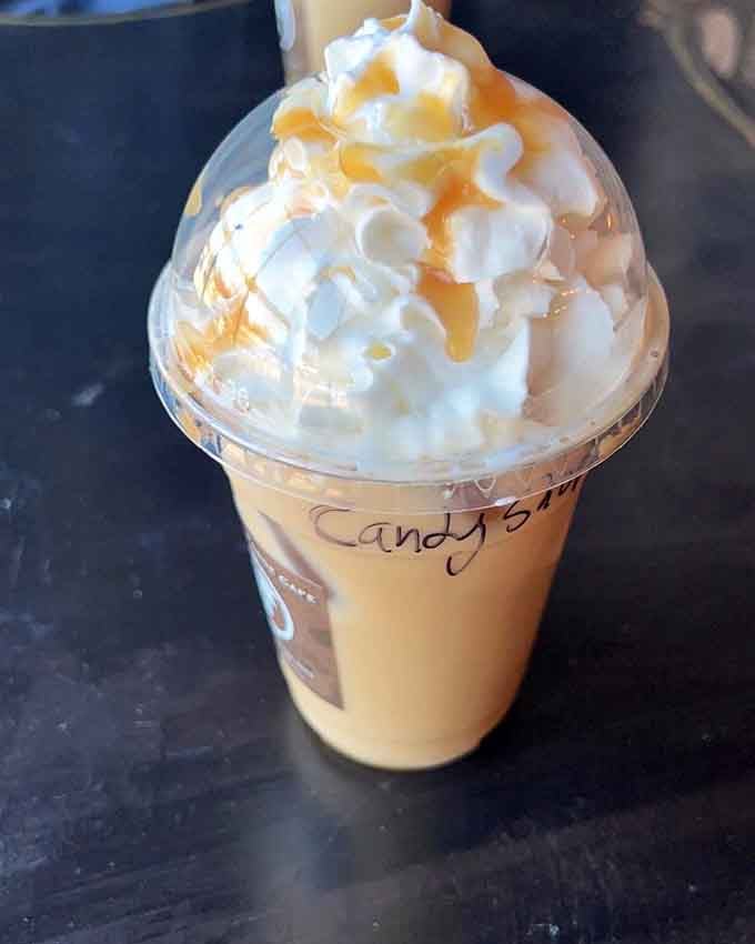 Whipped cream piled high on iced coffee is the kind of indulgence that makes any Tuesday feel like Saturday.