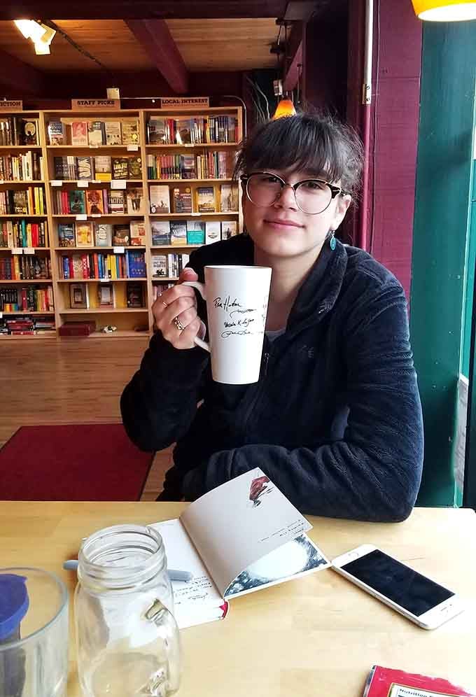 That contented smile says everything about the joy of good coffee and even better company.