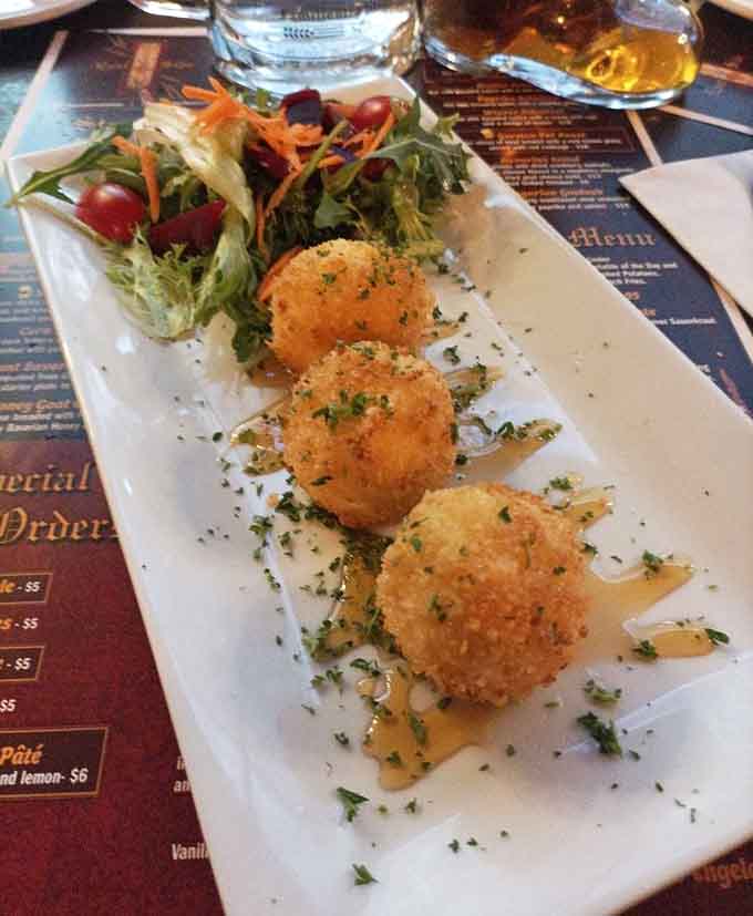 Bavarian honey goat cheese balls that are crispy on the outside and molten deliciousness on the inside.