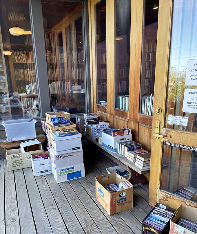 Even the porch overflows with books, because apparently indoors ran out of room for all this literary goodness.