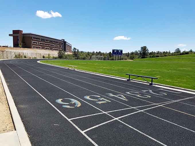The track and field facilities remind you that future pilots need to stay grounded before taking flight.