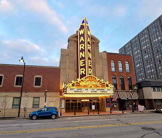 Warner Theatre's glowing marquee promises an evening of entertainment in surroundings that Hollywood would envy shamelessly.