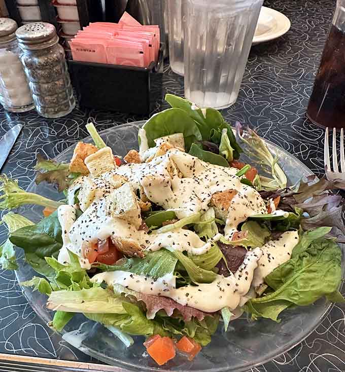 Fresh greens topped with grilled chicken and dressing that makes salad feel like a celebration.