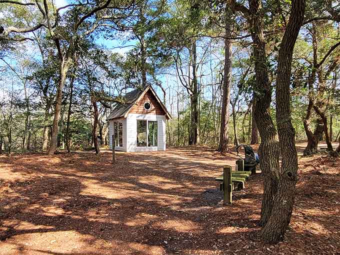 The Wash Woods church replica, a quiet reminder that communities once thrived in this remote wilderness.