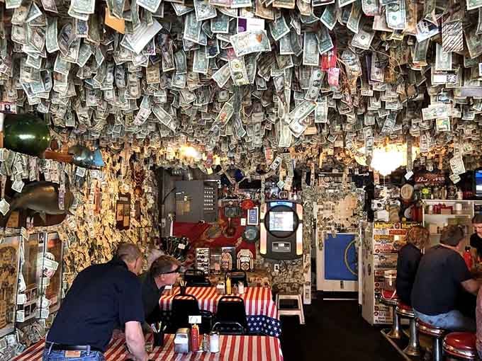 Locals and visitors alike, united under a canopy of currency, enjoying seriously good comfort food together.