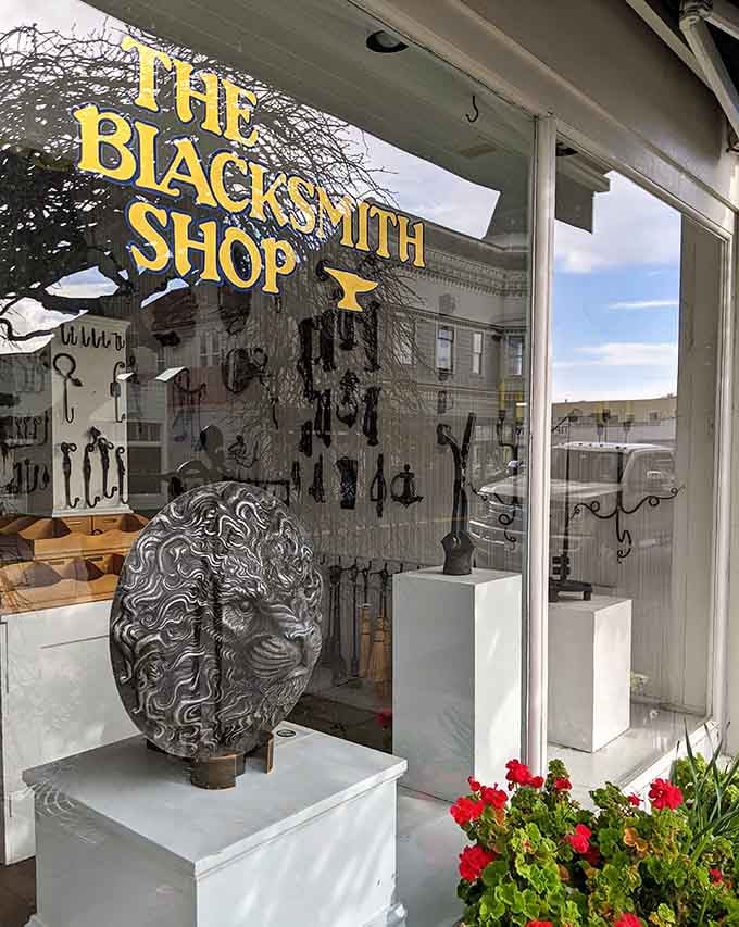 The Blacksmith Shop window displays craftsmanship from an era when "handmade" wasn't a premium upcharge.