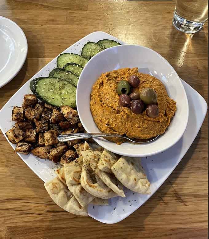 Red pepper hummus with all the accompaniments, because even ghost hunters need to keep their energy up with good food.