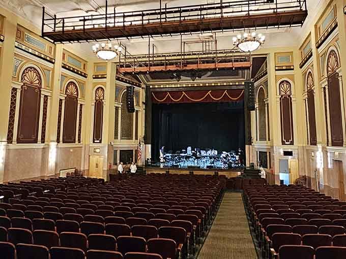 This grand theater interior whispers of a time when going out meant dressing up and actually talking.