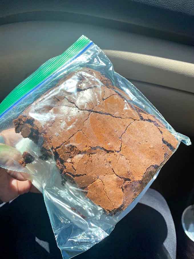 That brownie's crackly top is the kind of thing dessert dreams are made of, especially when it's fudgy underneath.