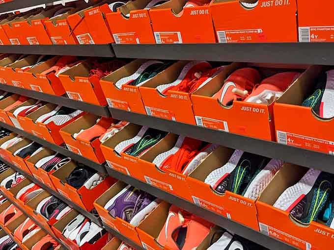 A wall of Nike sneakers in every color imaginable, proof that athletic footwear dreams really do come true.