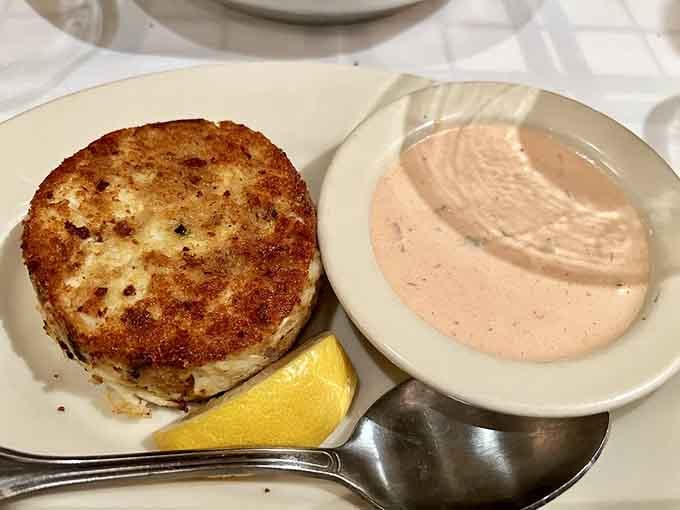 Golden-crusted crab cake perfection, where sweet meat takes center stage without unnecessary filler stealing the spotlight.
