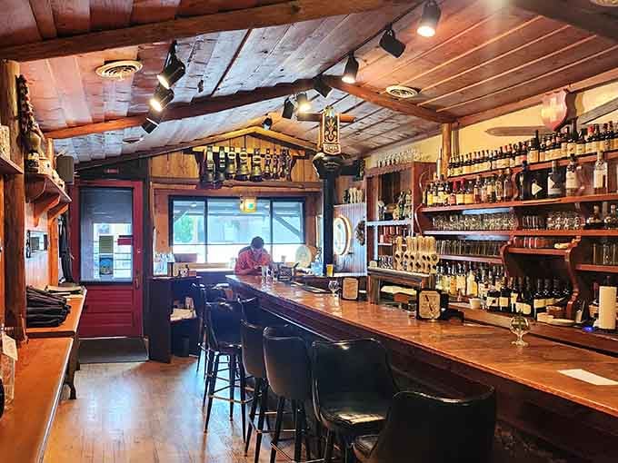 Belly up to this gorgeous wooden bar where the spirits selection rivals anything you'd find in Zurich.