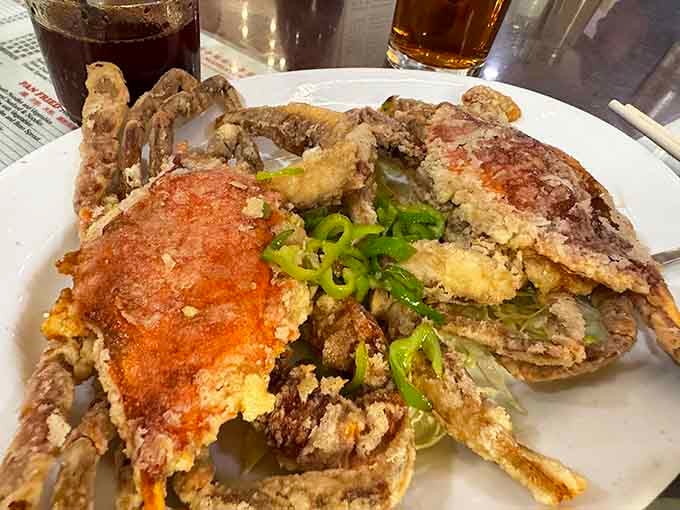 Salt-baked soft shell crabs so crispy and golden, they practically shimmer under the fluorescent lights.