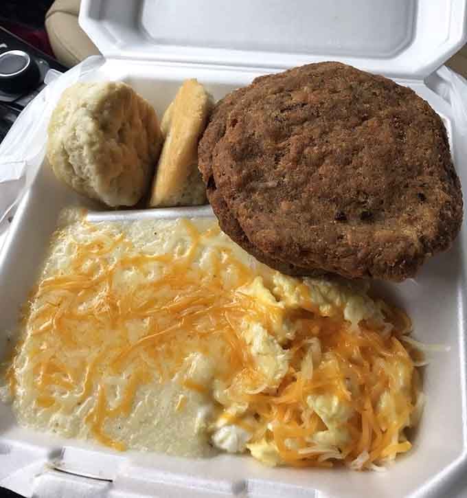 Salmon for breakfast with cheese grits and a biscuit shows this menu doesn't follow anyone else's rules.