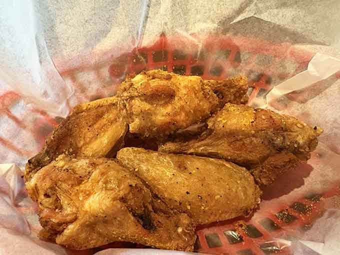 Lemon pepper wings with that perfect crispy coating will haunt your dreams in the best way.