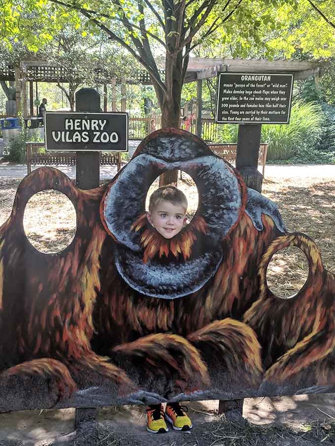 Nothing says family fun quite like sticking your face through a wooden orangutan for posterity's sake.