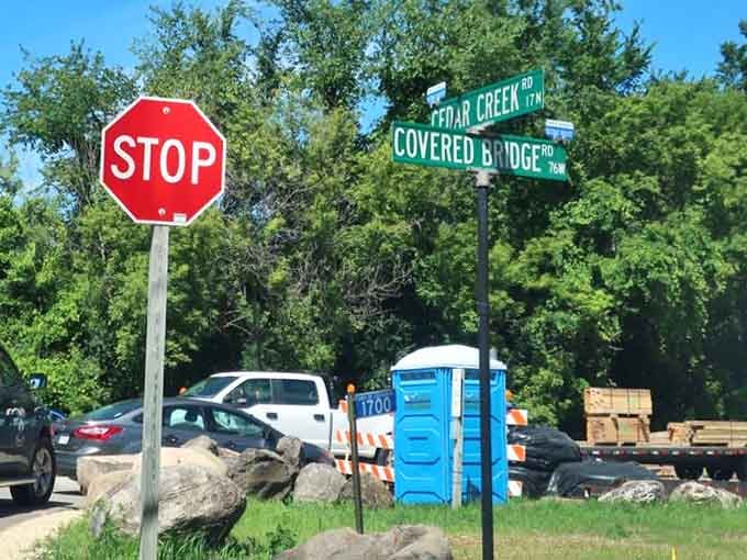 Even the street signs know this bridge is special, pointing the way to Wisconsin's wooden time machine.