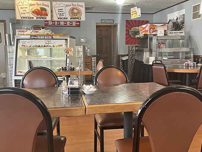 Wood paneling and vintage signs create an atmosphere where time slows down and breakfast tastes better.