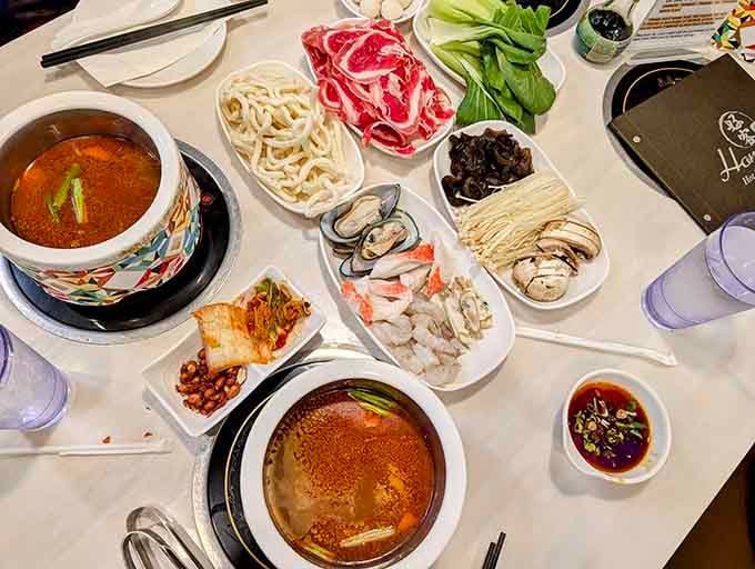 Hot pot heaven: bubbling broth, fresh ingredients, and the kind of interactive dining that makes everything taste better.