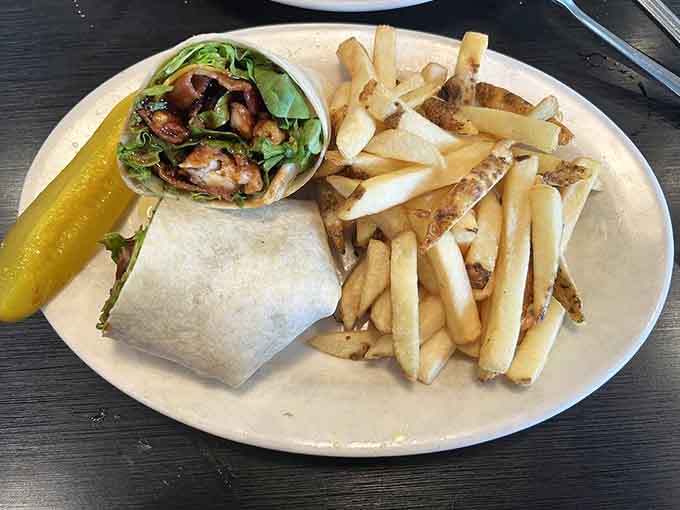 That BBQ chicken wrap comes with fries and a pickle, because balance is important in life.