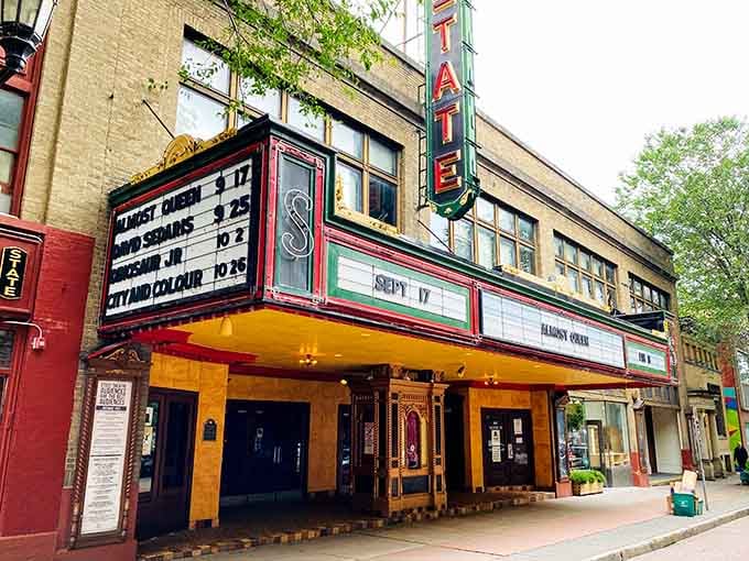 The State Theatre's vintage marquee glows with classic charm, back when going to the movies meant something special.
