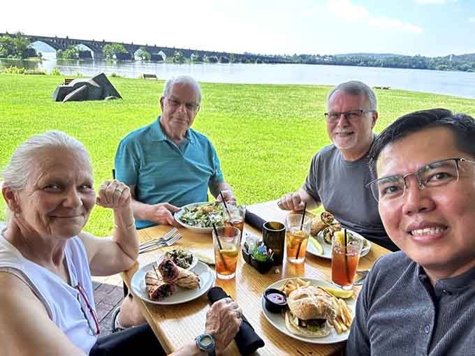 Riverside dining where the view competes with the food and somehow everybody wins.