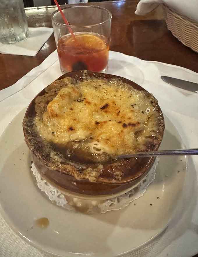 French onion soup with that glorious cheese blanket on top, the kind of classic that never disappoints or goes out of fashion.
