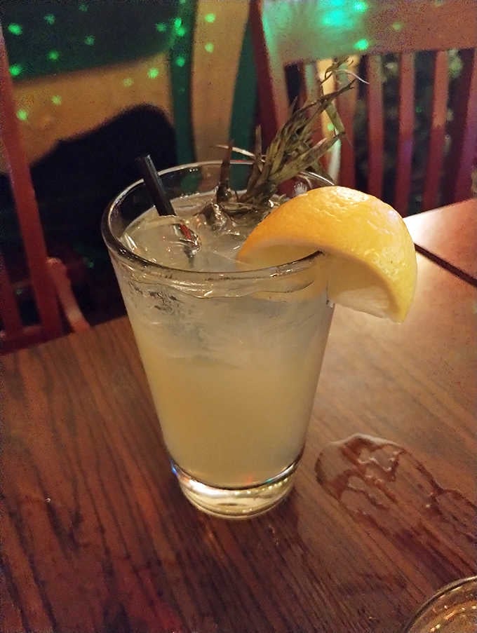 Citrus and herbs garnish this refreshing cocktail, because even Santa needs something light and bright sometimes.