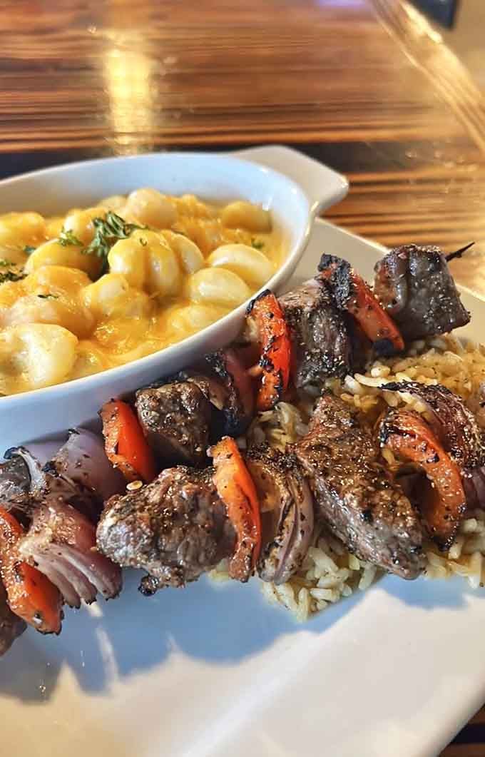 Steak kabobs paired with creamy mac and cheese, because sometimes surf and turf needs a cheesy third wheel.