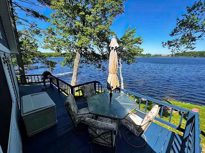 Your deck overlooks paradise, complete with umbrella shade for when even relaxation needs a little strategic planning.